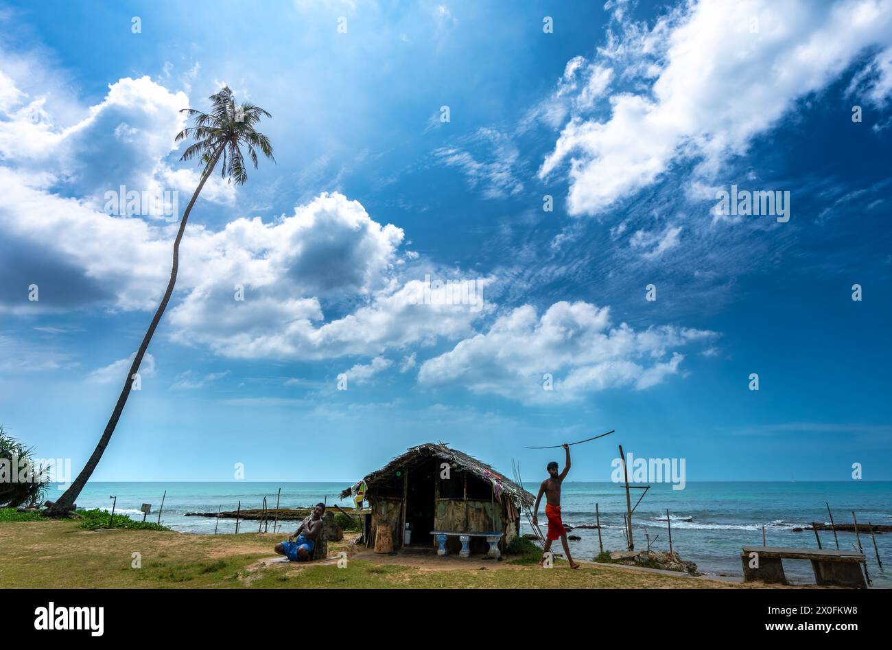 Southwest Coast, Sri Lanka - Jan 29, 2024: Fishermen practice stilt ...