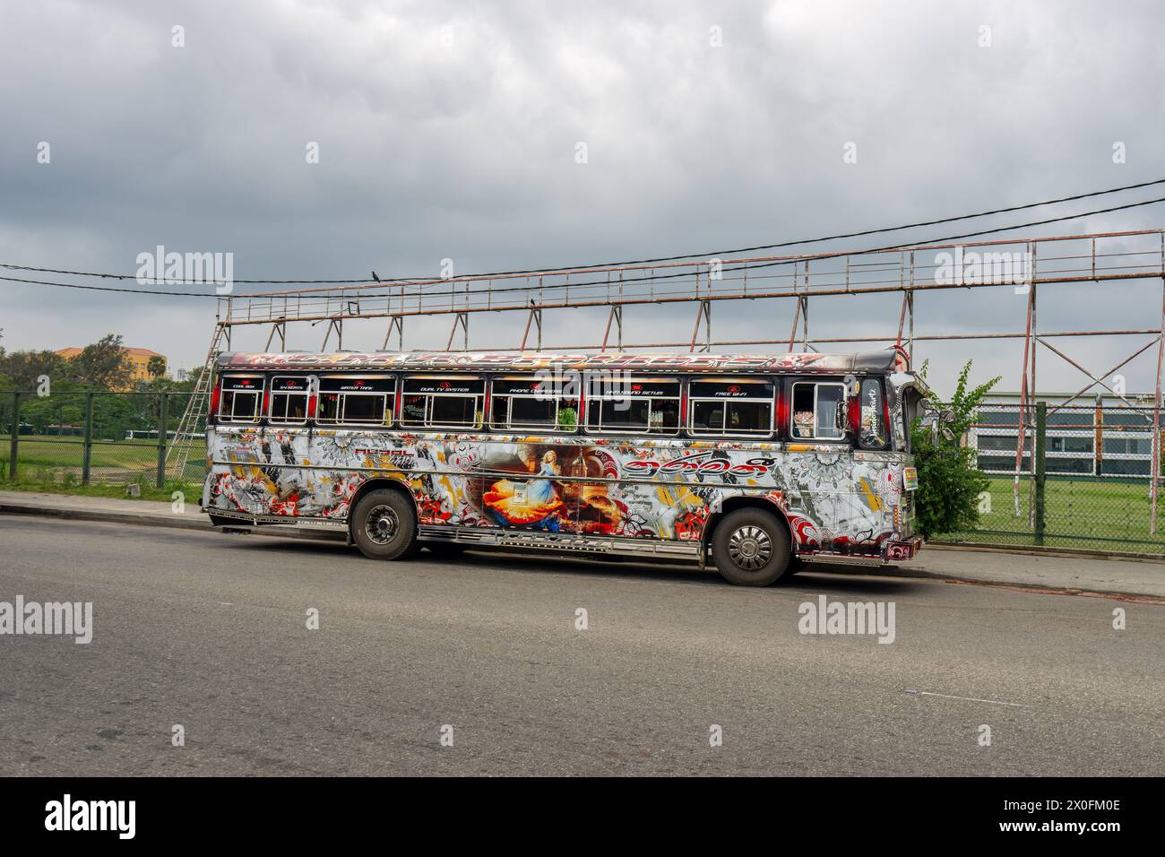 Galle, Sri Lanka - January 29, 2024: A colorful graffiti-covered bus ...