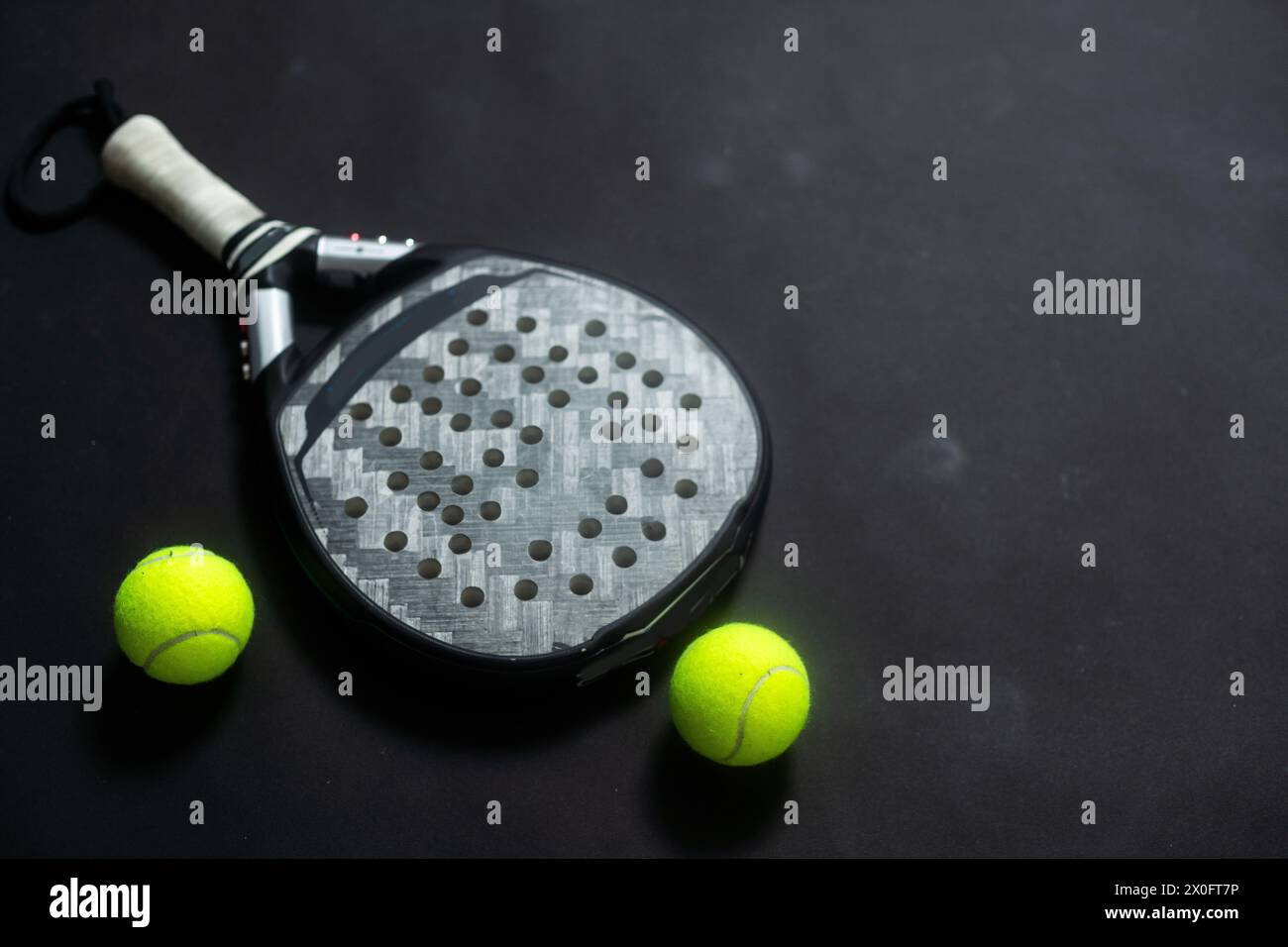 Isolated paddle tennis objects black background Stock Photo - Alamy