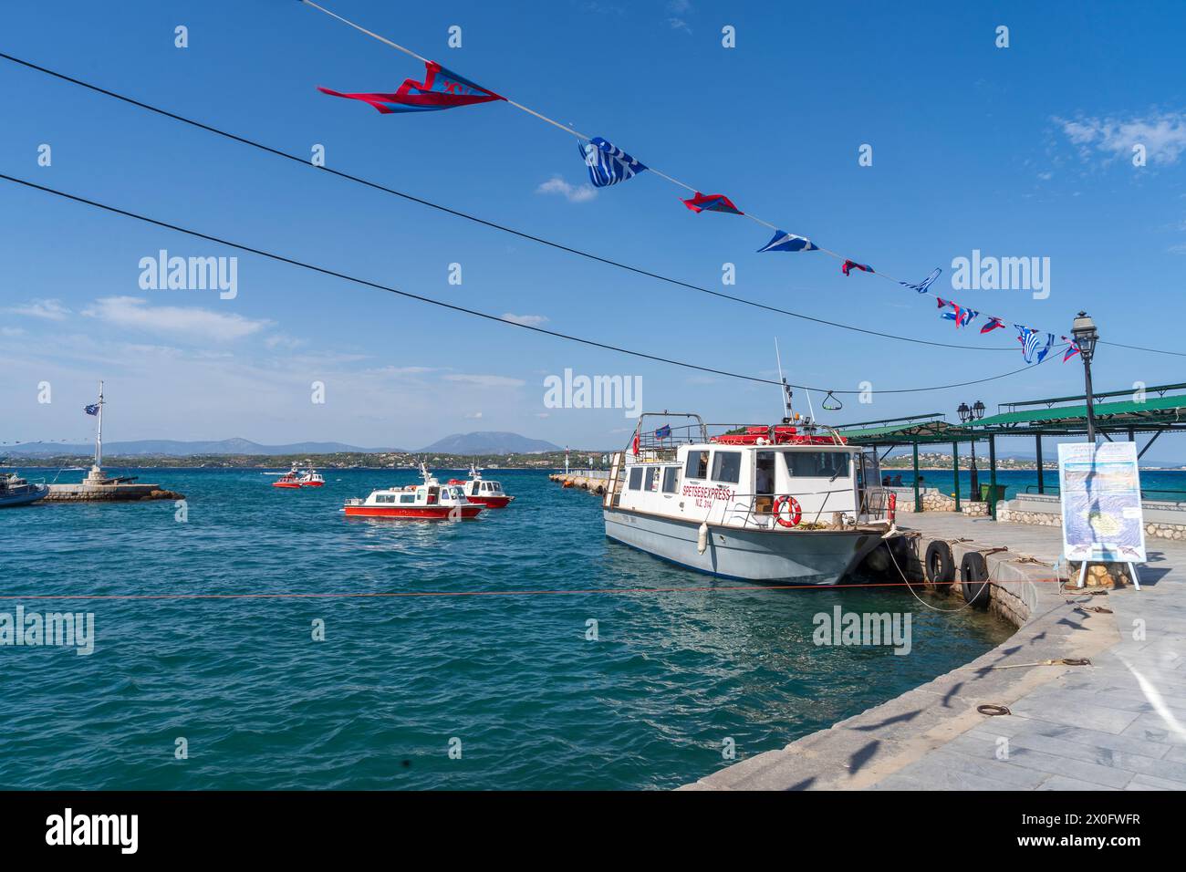 Sea taxis at the small port of Dapia, in Spetses island, Greece, on the ...