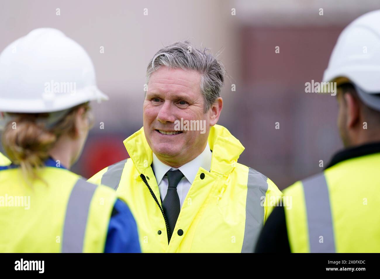 Labour Party leader Sir Keir Starmer talking to workers during a ...