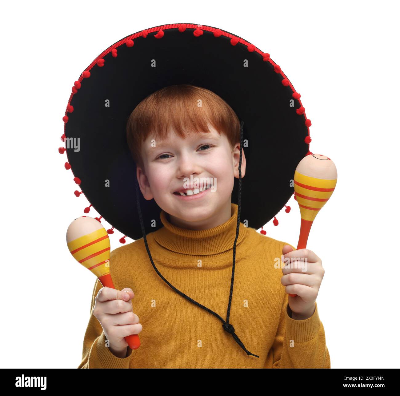 Cute boy in Mexican sombrero hat with maracas on white background Stock ...