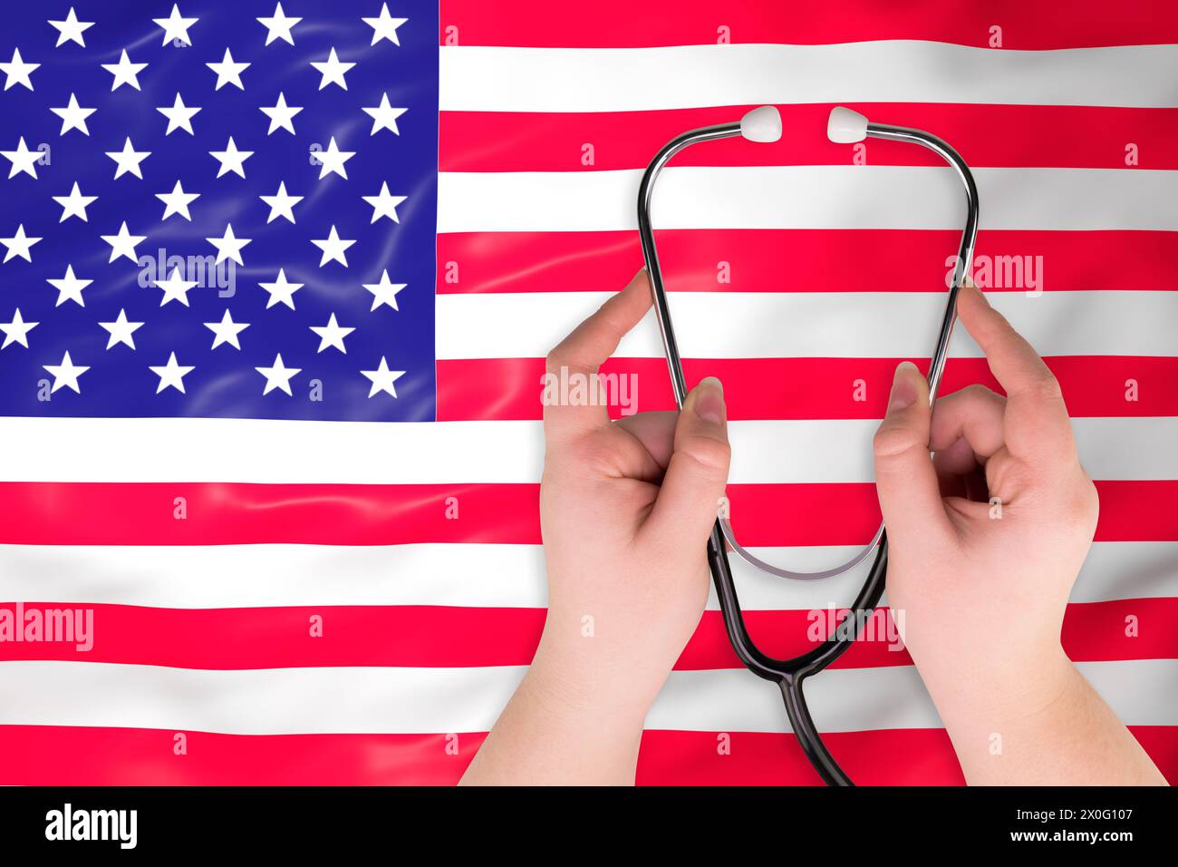 Medical stethoscope in hands (close-up) against the background of the ...