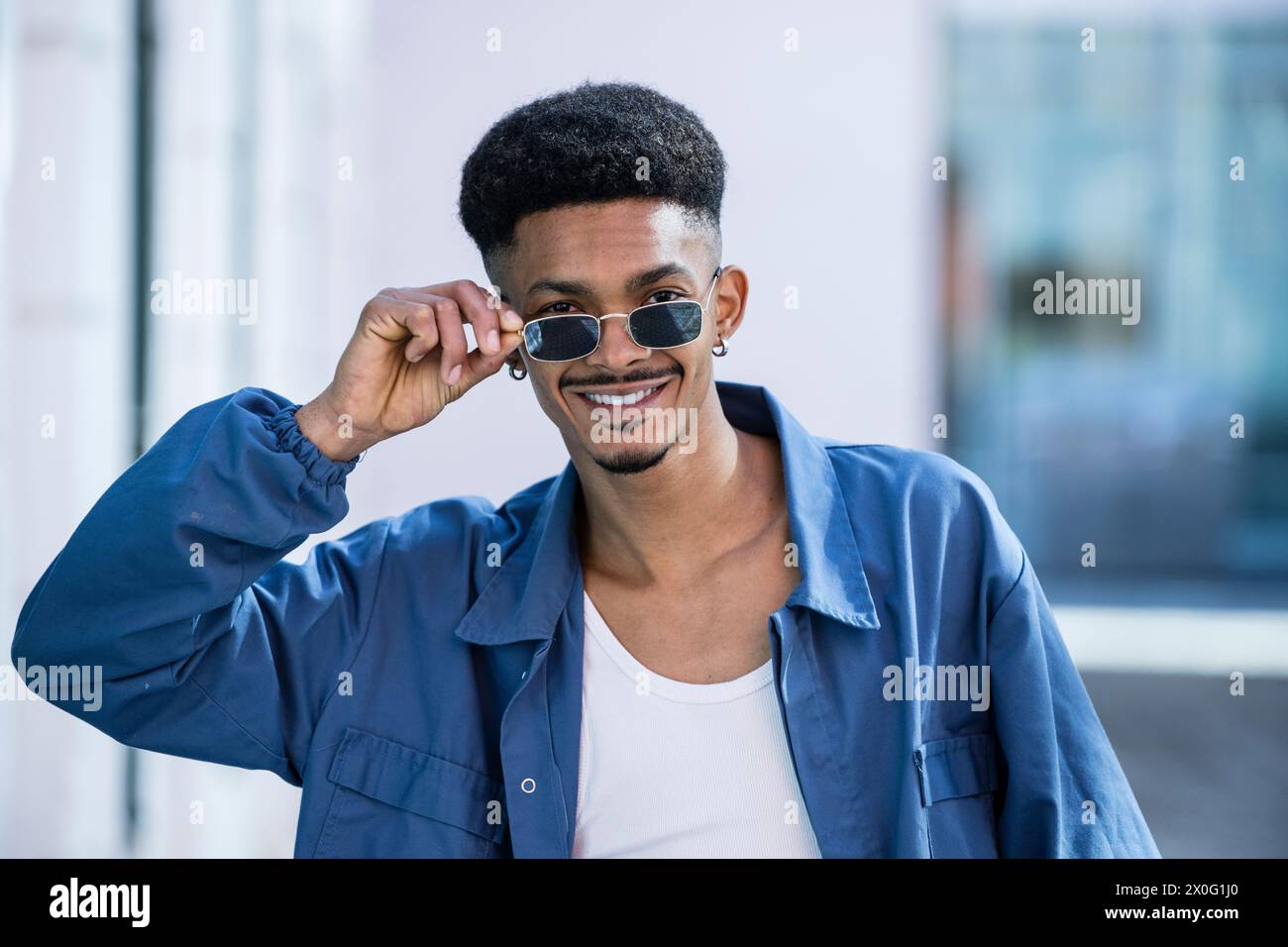 Male serious smiling model hi-res stock photography and images - Alamy