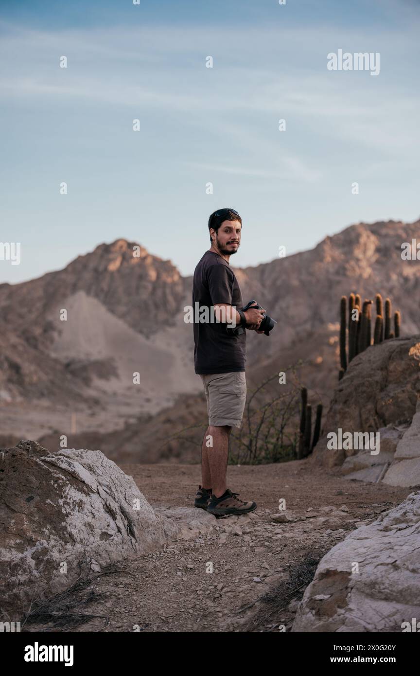 Portrait man taking landscape photos hi-res stock photography and ...