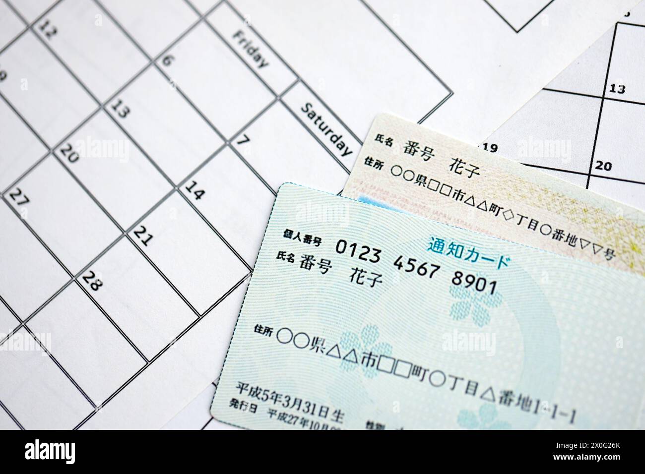 Japanese my number card specimen and notification card on calendar ...