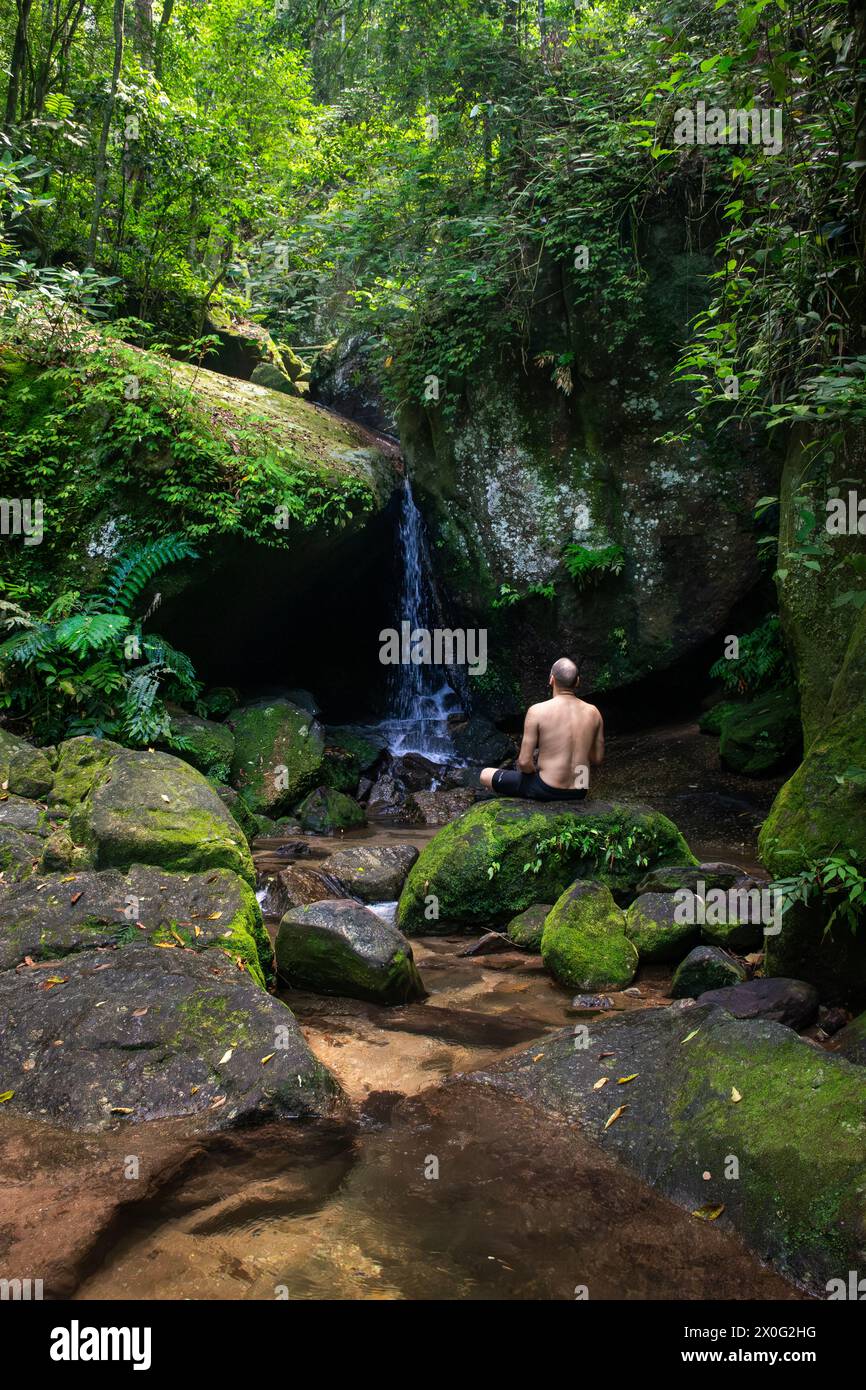 Man bathing in waterfall hi-res stock photography and images - Alamy
