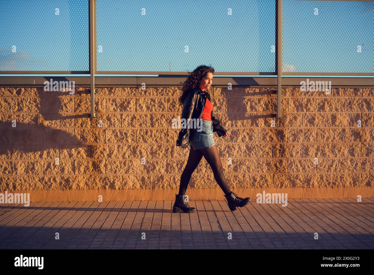 Young woman confidently walking hi-res stock photography and images - Alamy