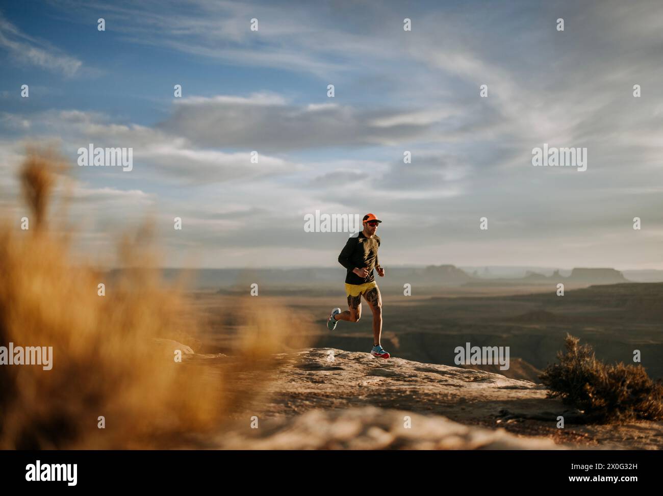 Male running through desert hi-res stock photography and images - Alamy