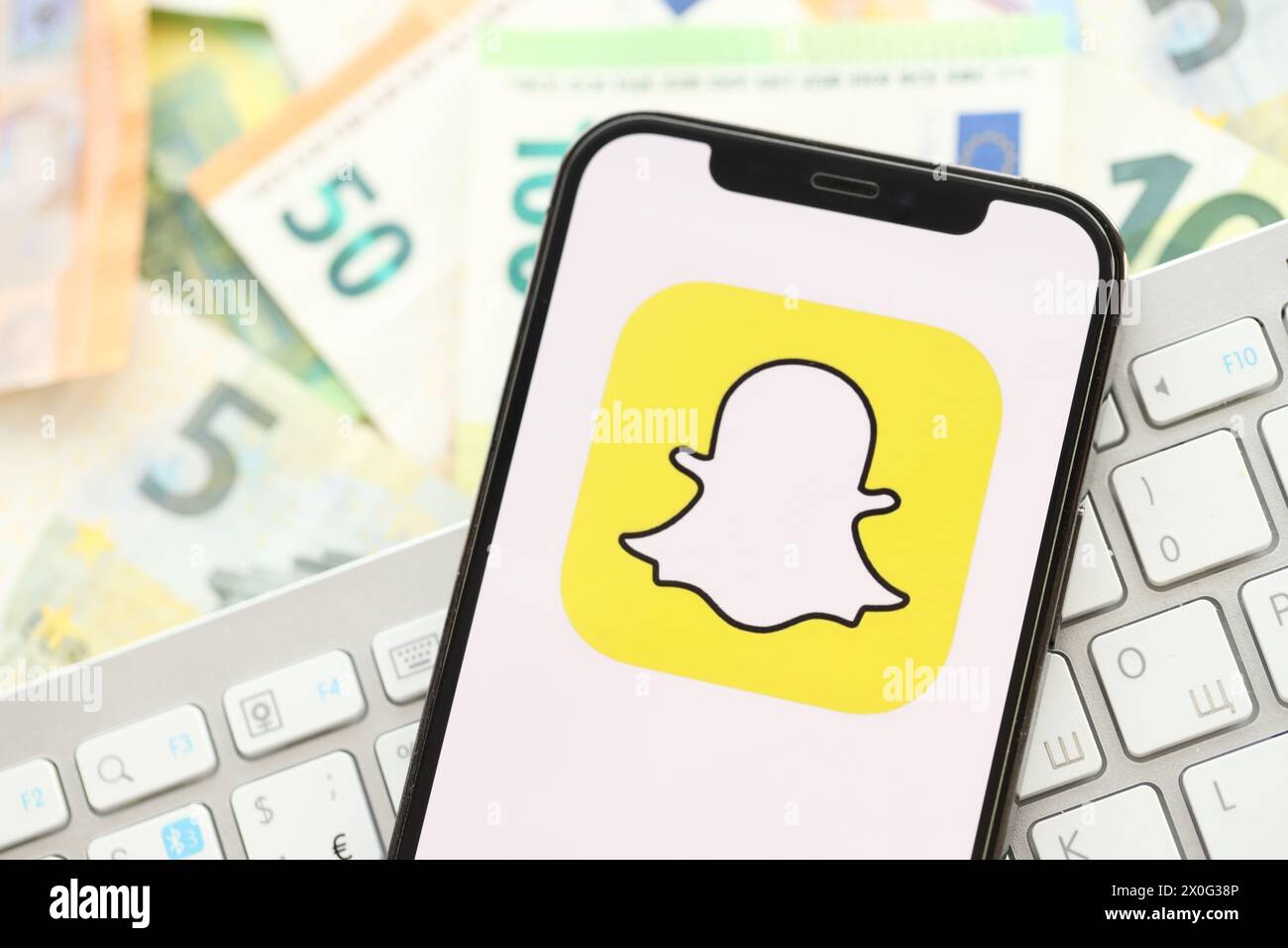 KYIV, UKRAINE - APRIL 1, 2024 Snapchat icon on smartphone screen on ...