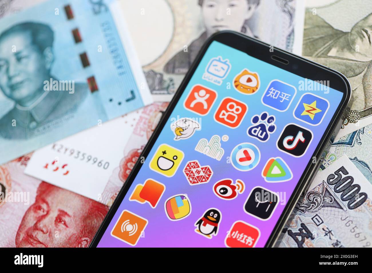 KYIV, UKRAINE - APRIL 1, 2024 Asian apps icon on smartphone screen on ...