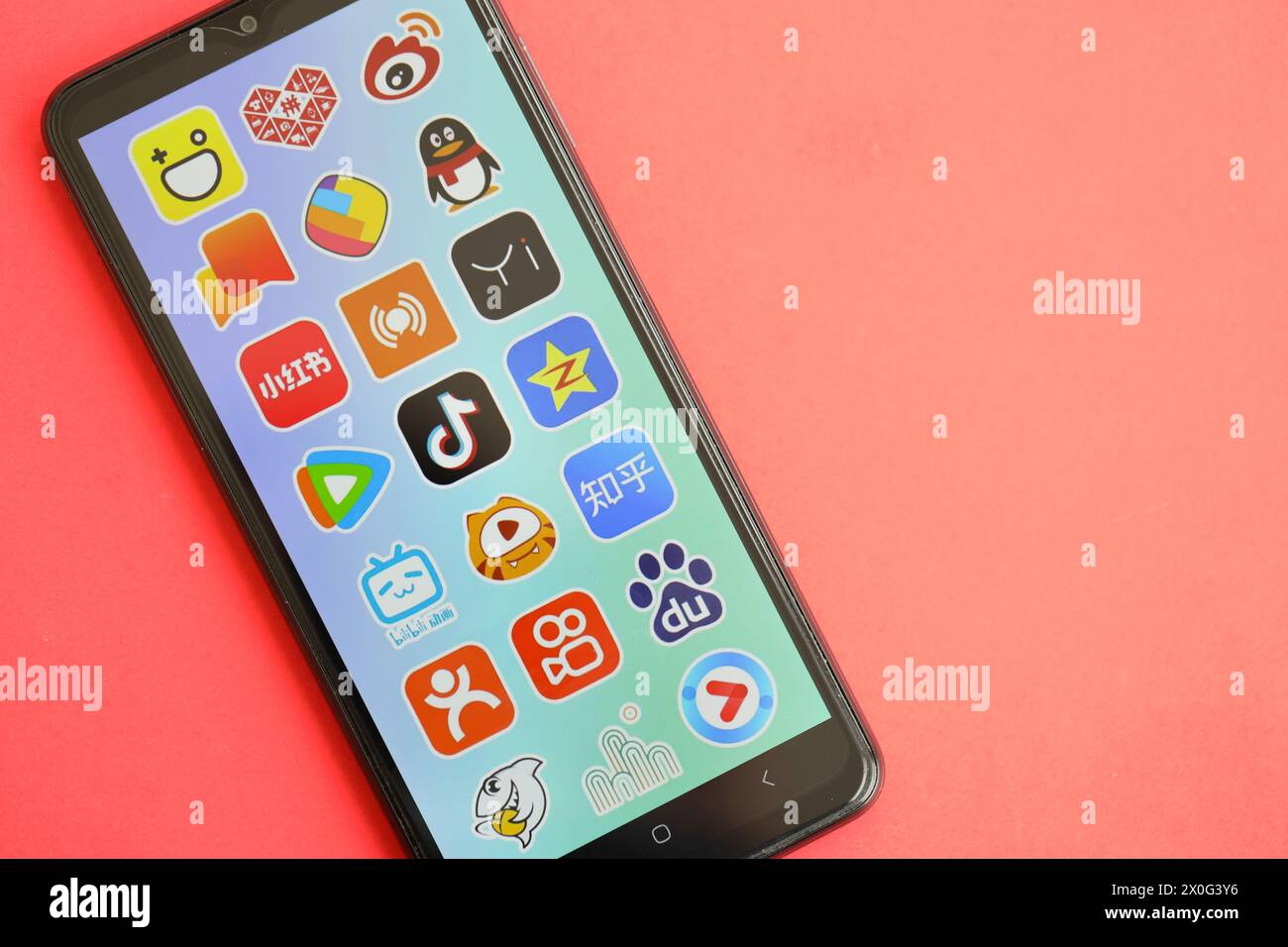 KYIV, UKRAINE - APRIL 1, 2024 Asian apps icon on smartphone screen on ...