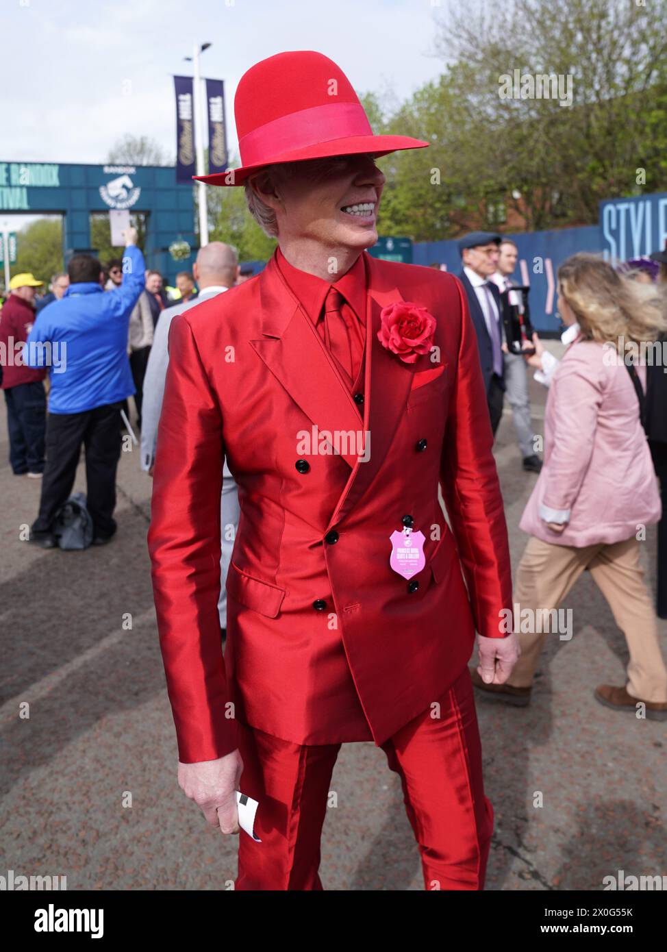 A racegoer arrives on day two of the 2024 Randox Grand National ...