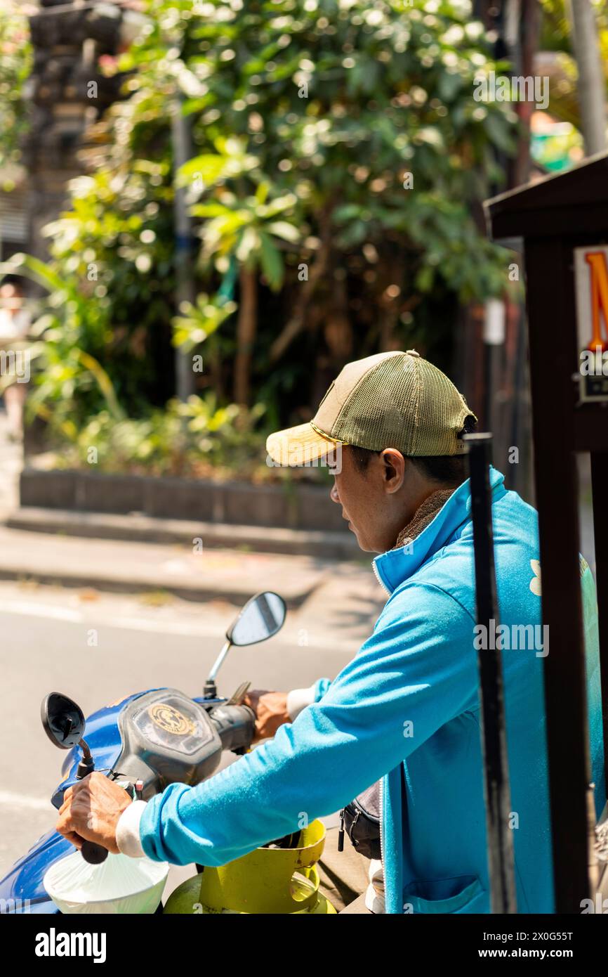 Man driving a scooter hi-res stock photography and images - Alamy