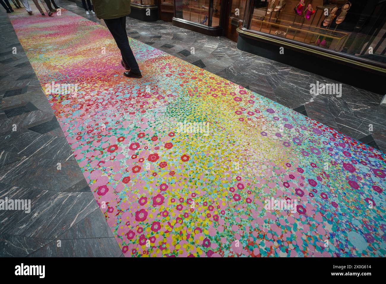 London 12 April 2024 . Rosette flowers decorate the Burlington Arcade ...