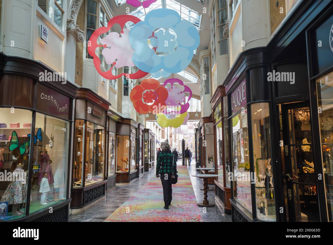London 12 April 2024 . Rosette flowers decorate the Burlington Arcade ...