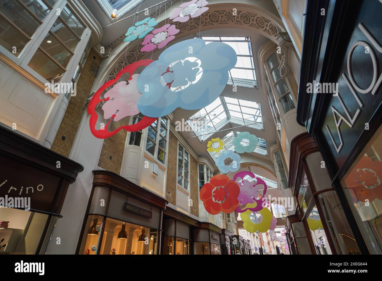London 12 April 2024 . Rosette flowers decorate the Burlington Arcade ...
