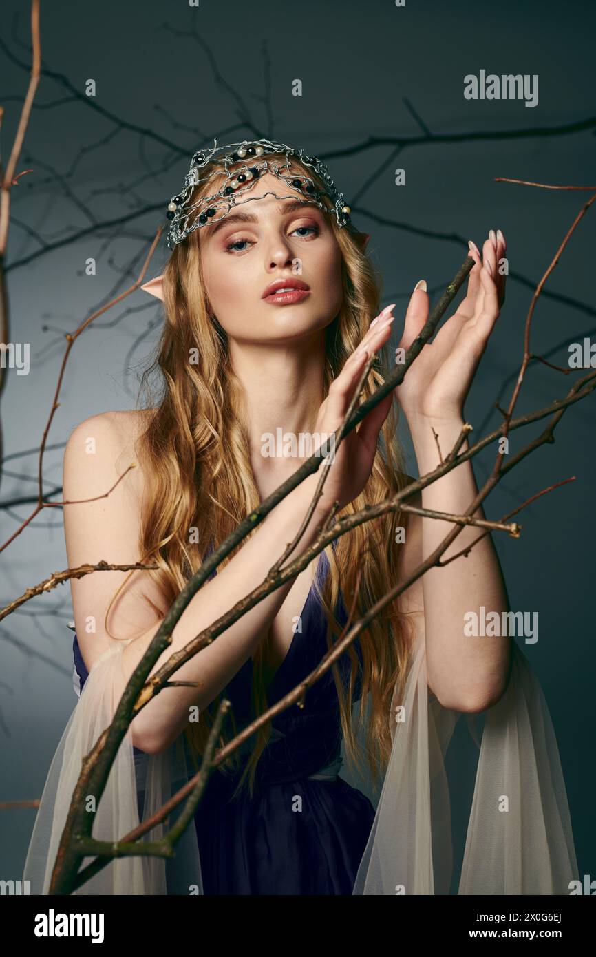 A young woman crowned in a majestic crown, dressed in a beautiful blue ...