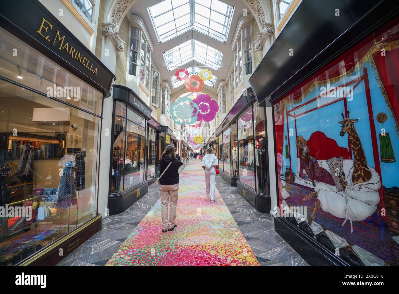 London 12 April 2024 . Rosette flowers decorate the Burlington Arcade ...