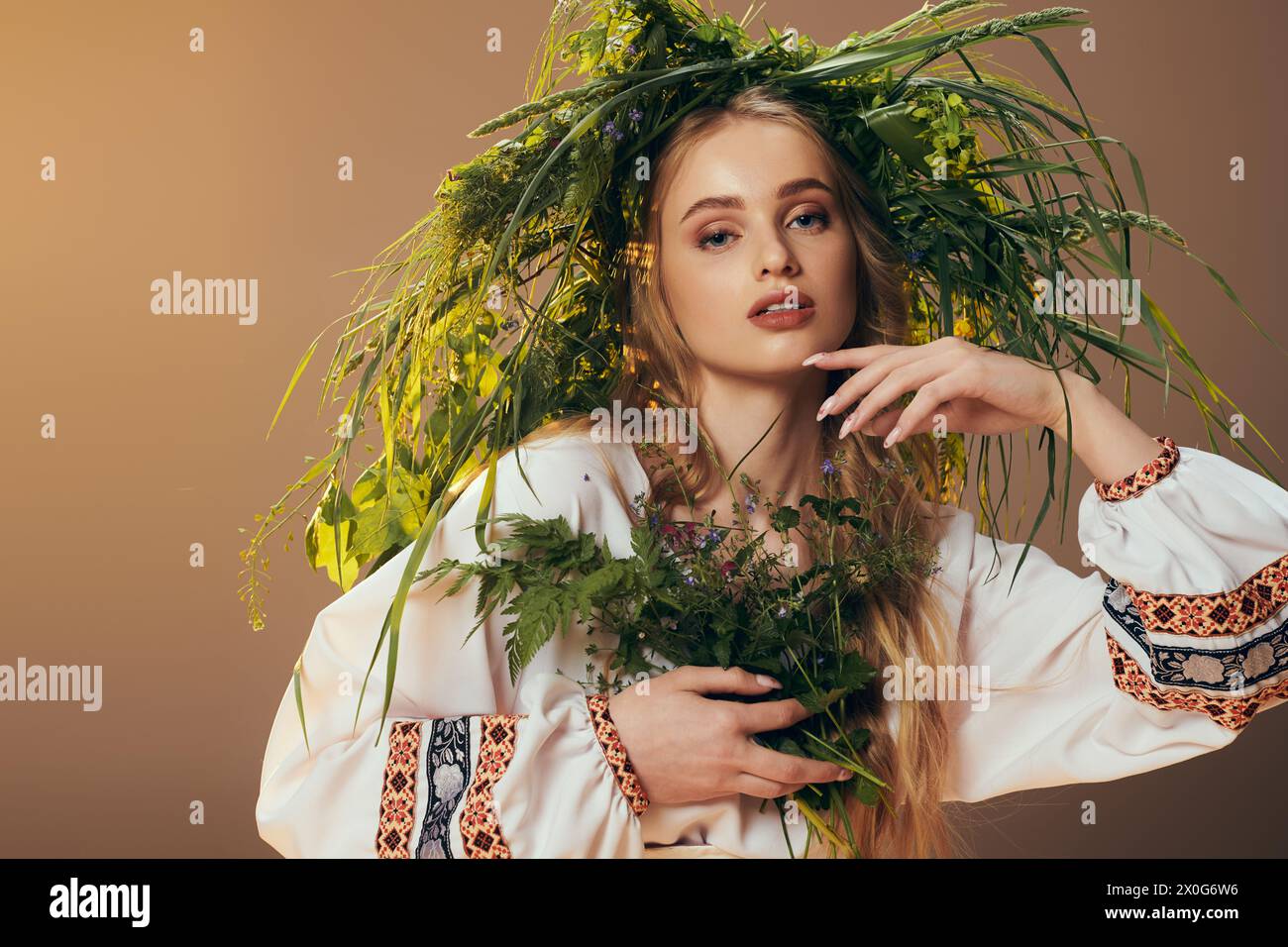 A young woman in a traditional outfit adorned with an ornate wreath in ...