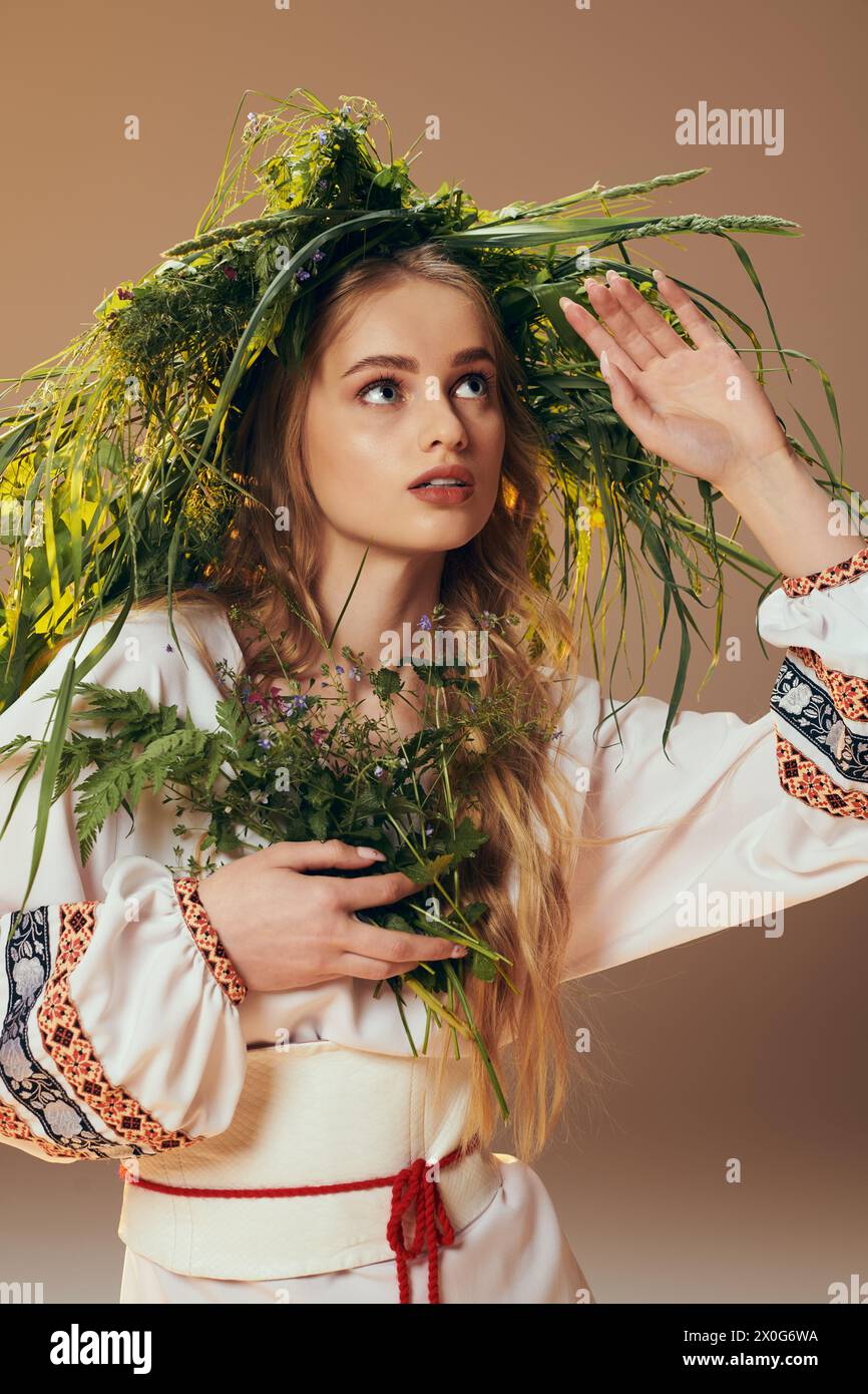 A young woman in a traditional outfit adorned with an ornate wreath, in ...
