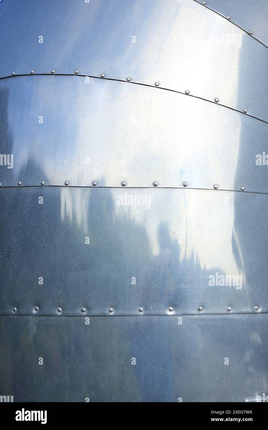 Curved corner of airstream travel trailer vehicle showing rivets and ... Curved corner of airstream travel trailer vehicle showing rivets and ...