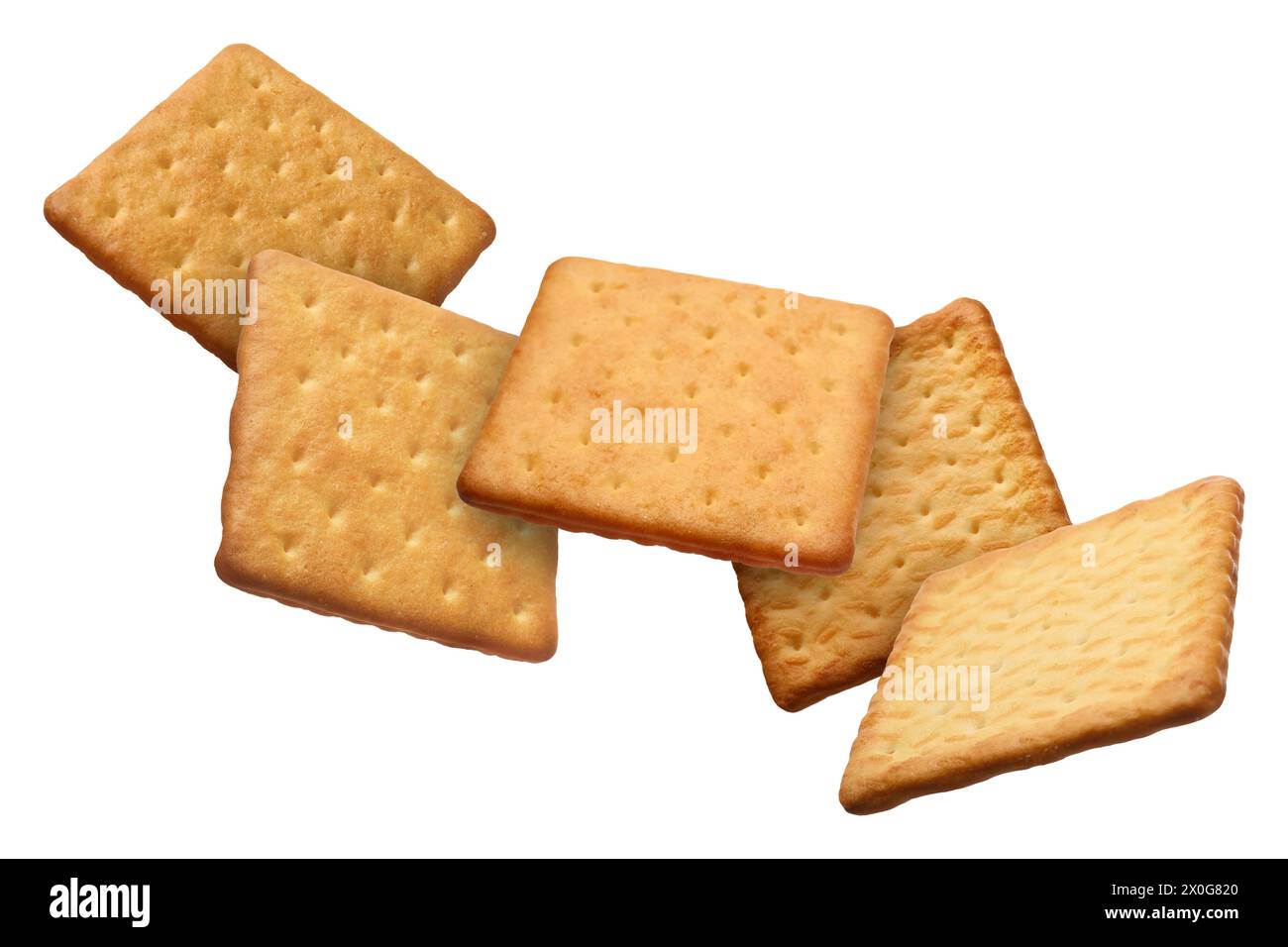 Tasty dry square crackers falling on white background Stock Photo - Alamy