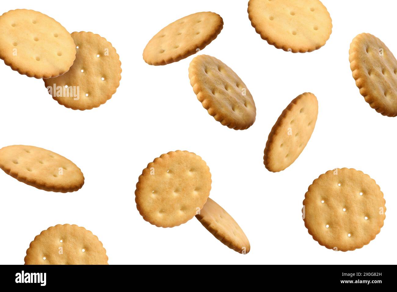Tasty dry round crackers falling on white background Stock Photo - Alamy