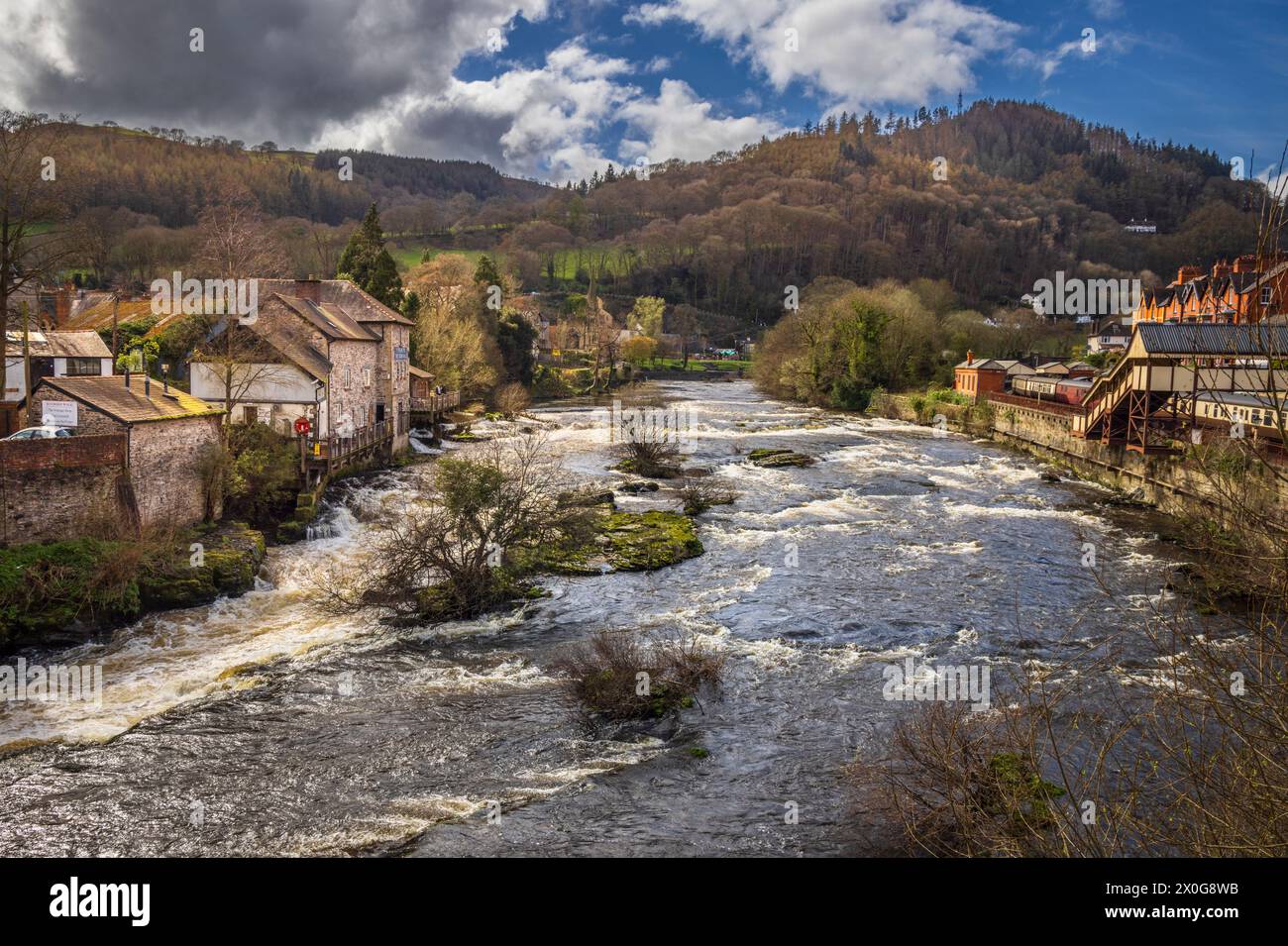 The old watermill and station on the River Dee at Llangollen ...