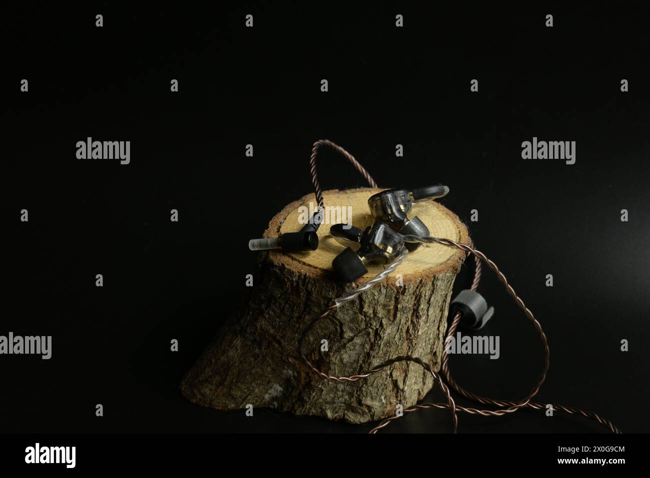 high sound wired headphones on black background Stock Photo - Alamy