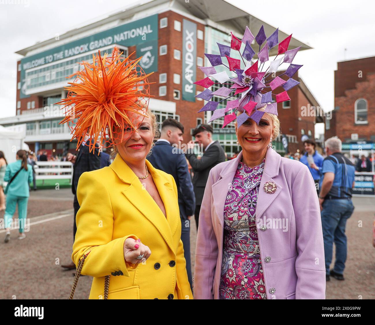 Racegoers arrive on ladies day during the The Randox Grand National ...