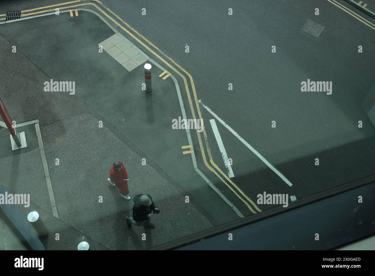 Road markings and pavement with kerb white lines and yellow lines ...