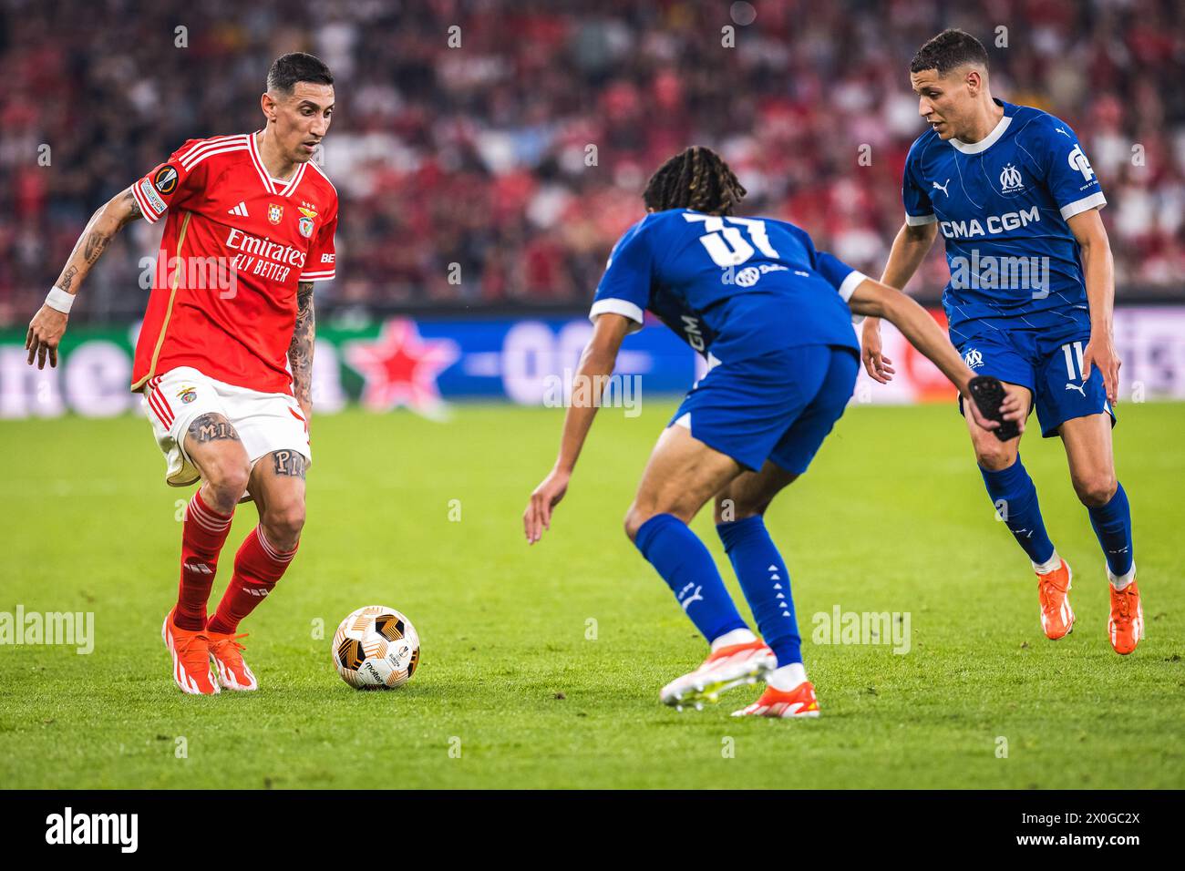 Lisbon, Portugal. 11th Apr, 2024. Angel Di Maria of SL Benfica (L) with Emran Soglo (C) and ...
