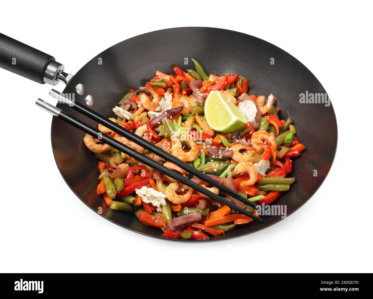 Shrimp stir fry with vegetables in wok and chopsticks isolated on white ...
