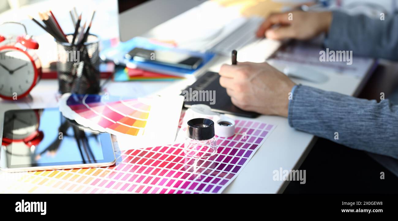 Test print paper page with colour test design fantail and magnifying ...