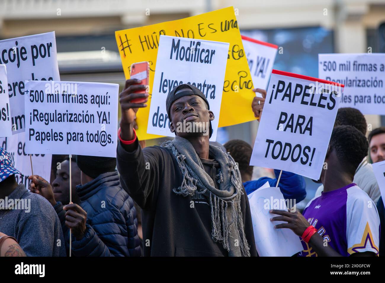 A man takes a selfie during a rally. Concentration in the Plaza de ...