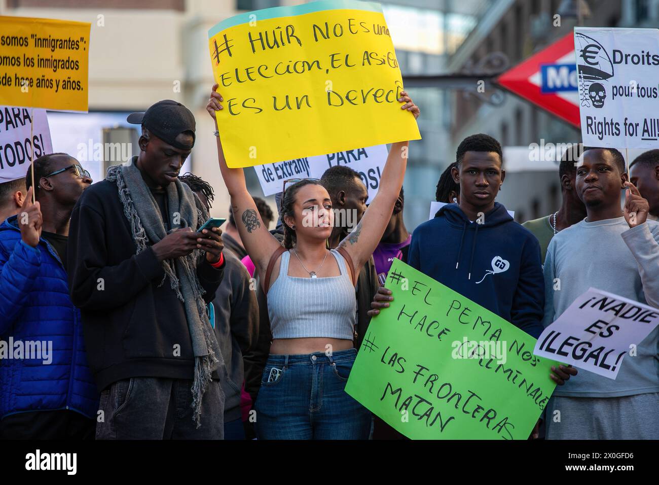 Protesters hold placards during the rally. Concentration in the Plaza ...