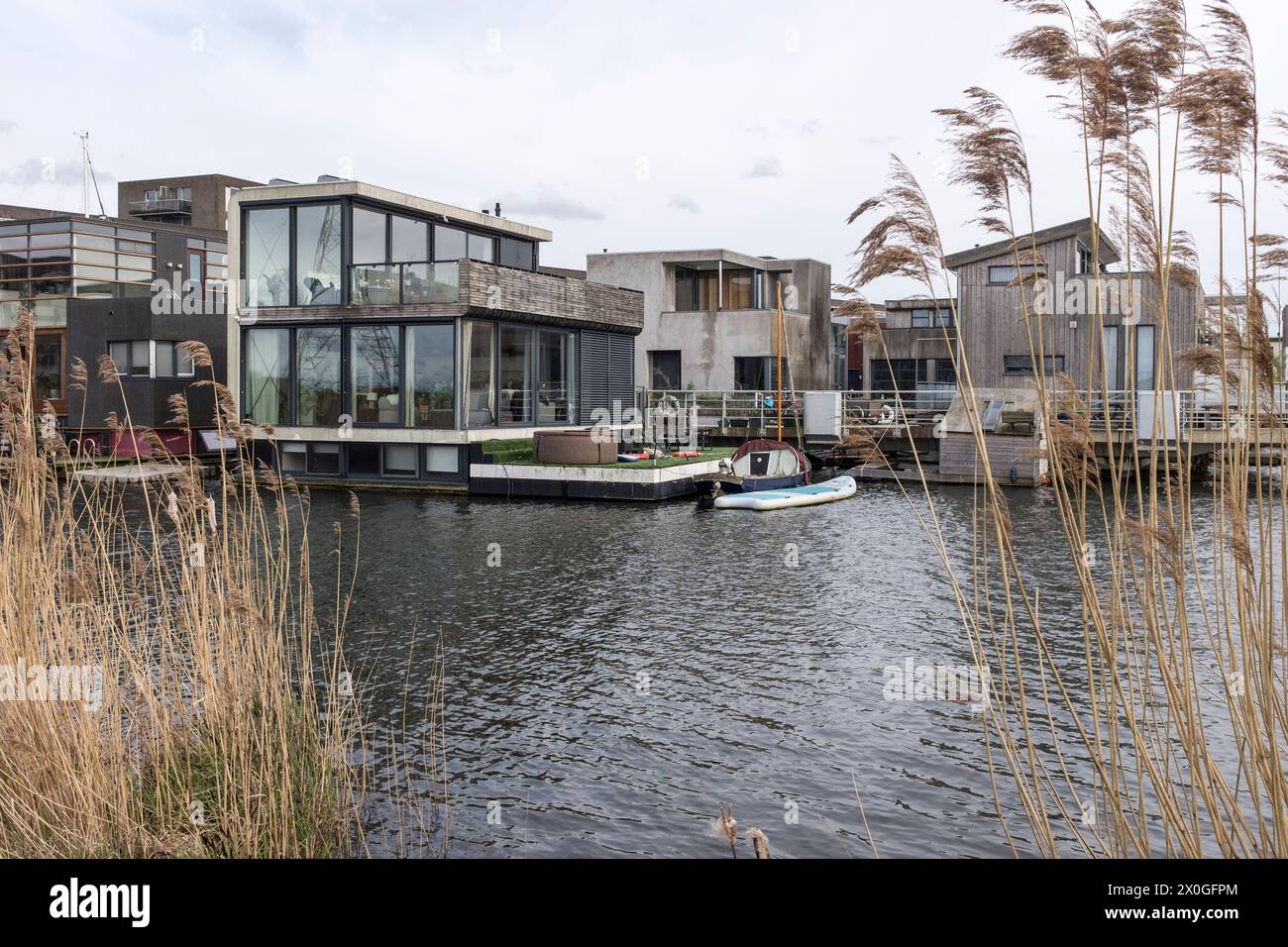 Floating homes and houses in the Waterbuurt (Water District) of Ijburg ...