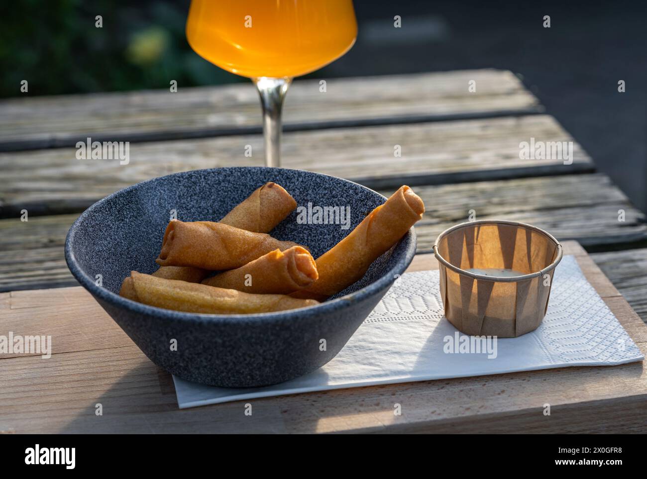 Delicious cheese spring rolls snack. Cheese sticks wrapped in a spring ...