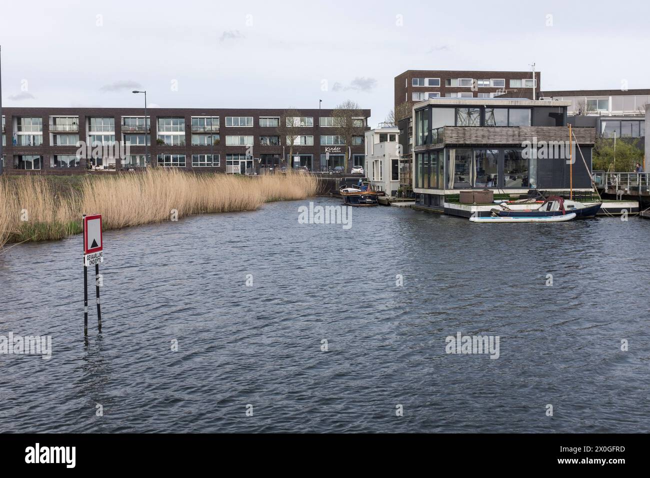 Floating homes and houses in the Waterbuurt (Water District) of Ijburg ...