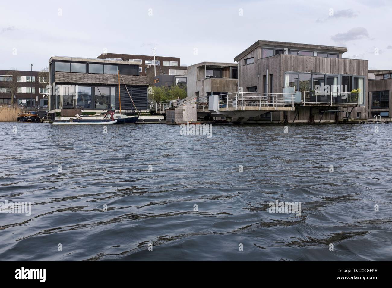 Floating homes and houses in the Waterbuurt (Water District) of Ijburg ...