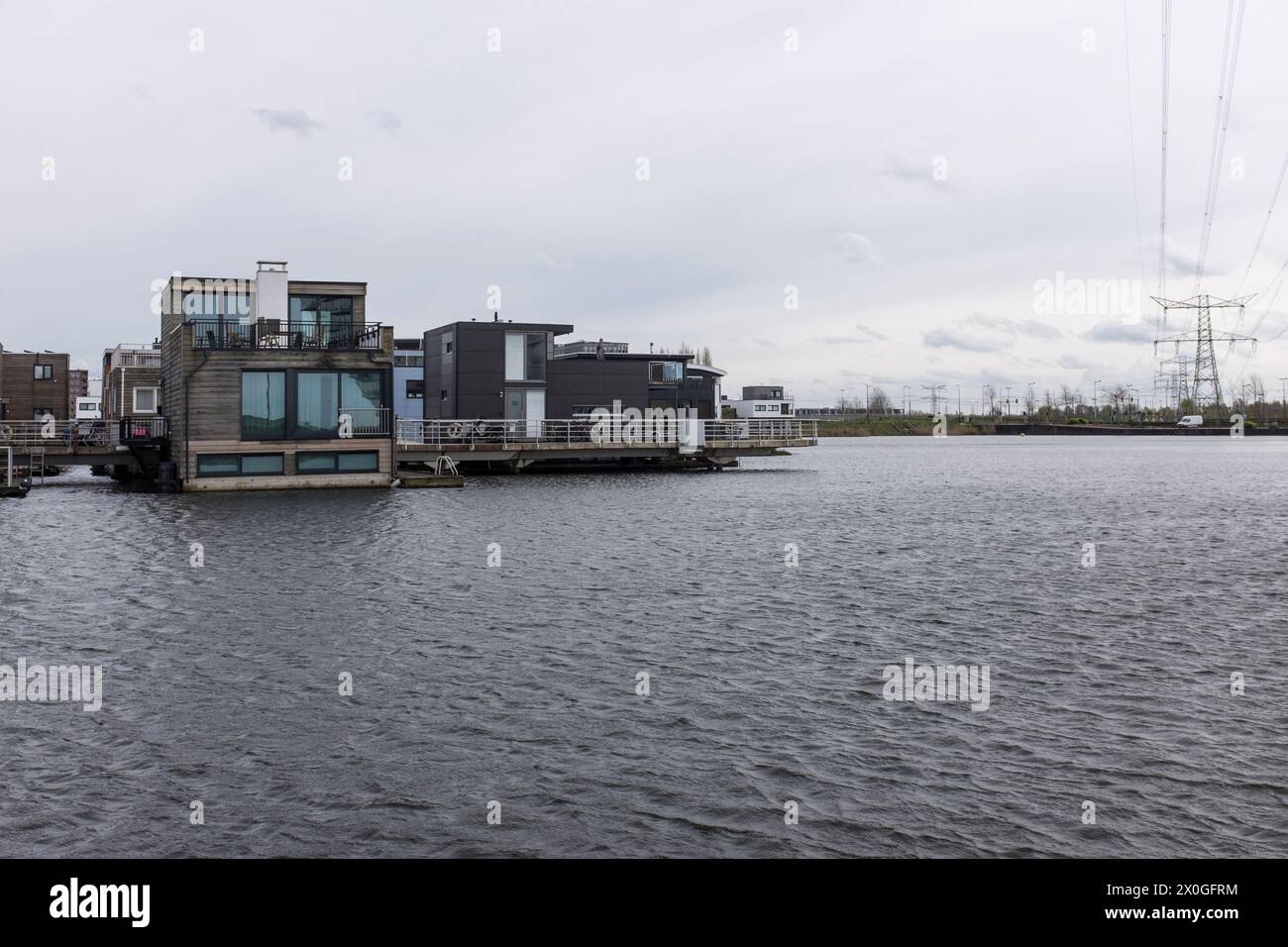 Floating homes and houses in the Waterbuurt (Water District) of Ijburg ...