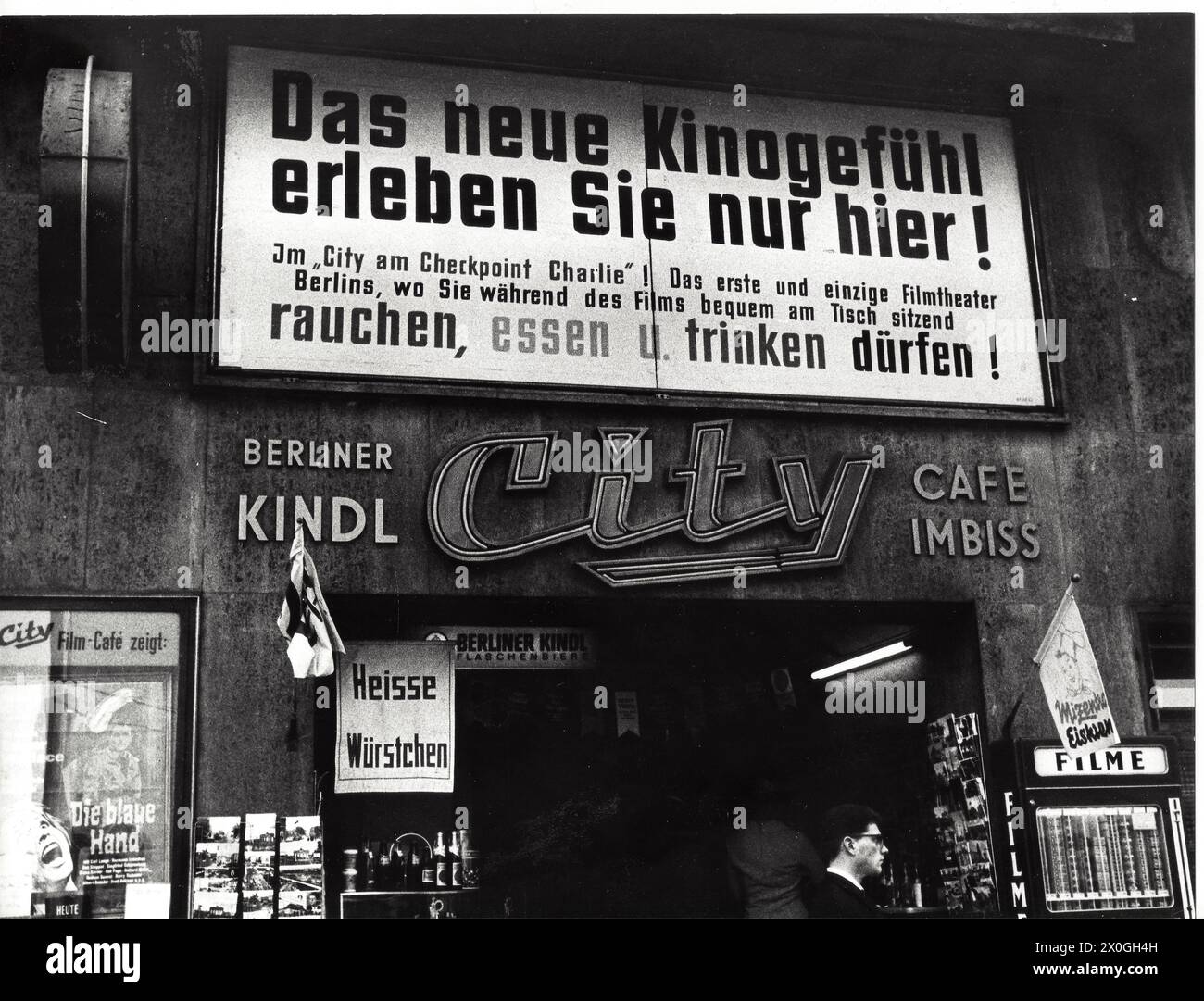 "Advertising poster of the Berlin City Cinema at Checkpoint Charlie ...