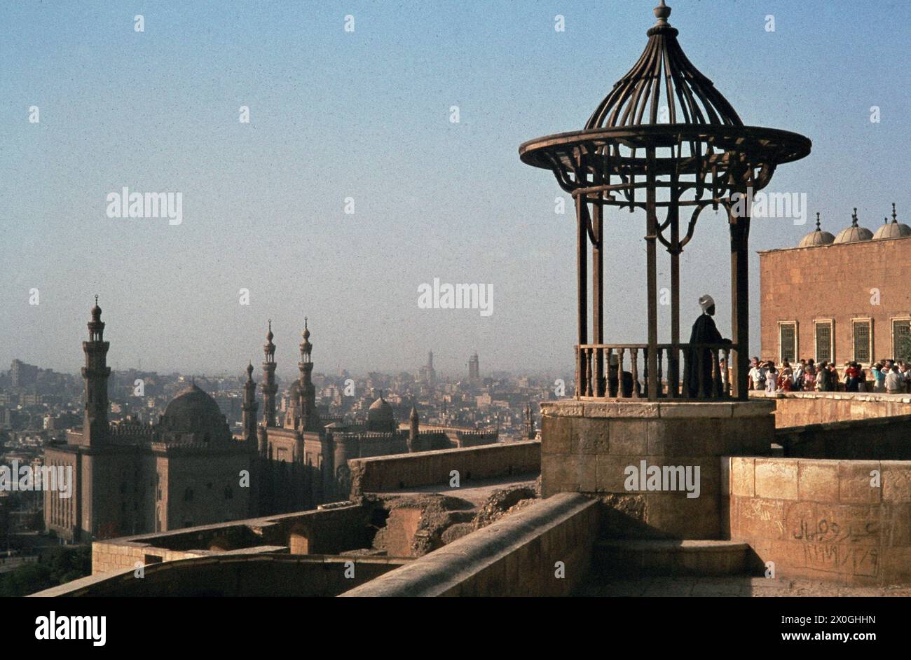 A man stands in the pavilion of the Mohammed Ali Mosque in front of the ...
