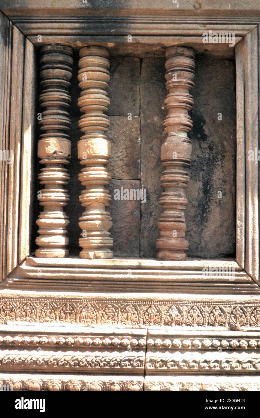 A blind window with turned columns in Khmer style in Phanom Rung Stock ...