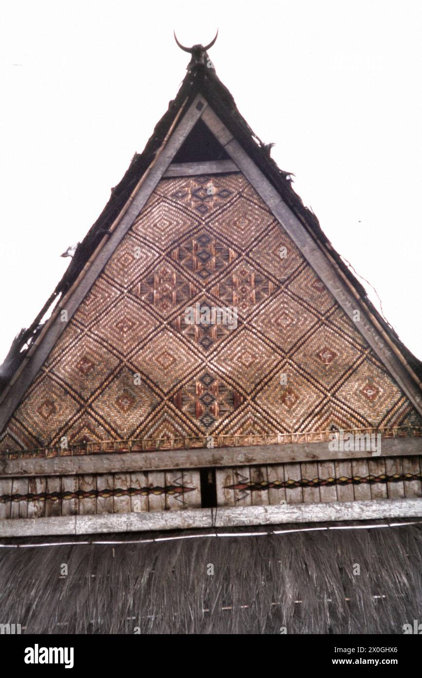 The detailed decorated gable of a Karo Batak house in Lingga near ...