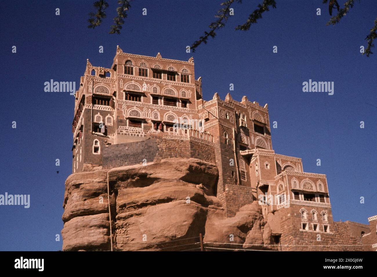 The Immam Palace built on a rock in the Yemeni Wadi Dhar. [automated ...