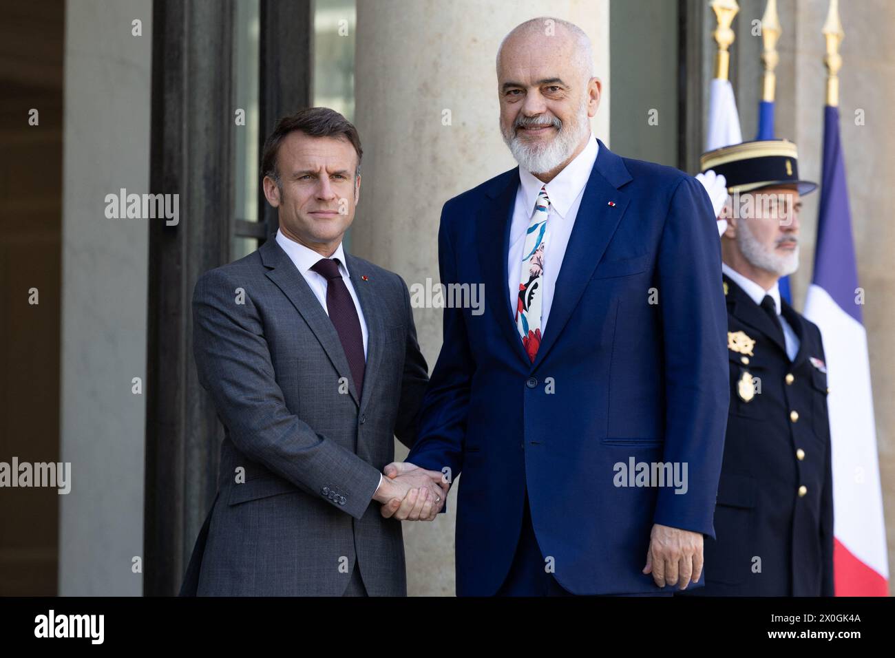 Paris, France. 12th Apr, 2024. French President Emmanuel Macron greets ...