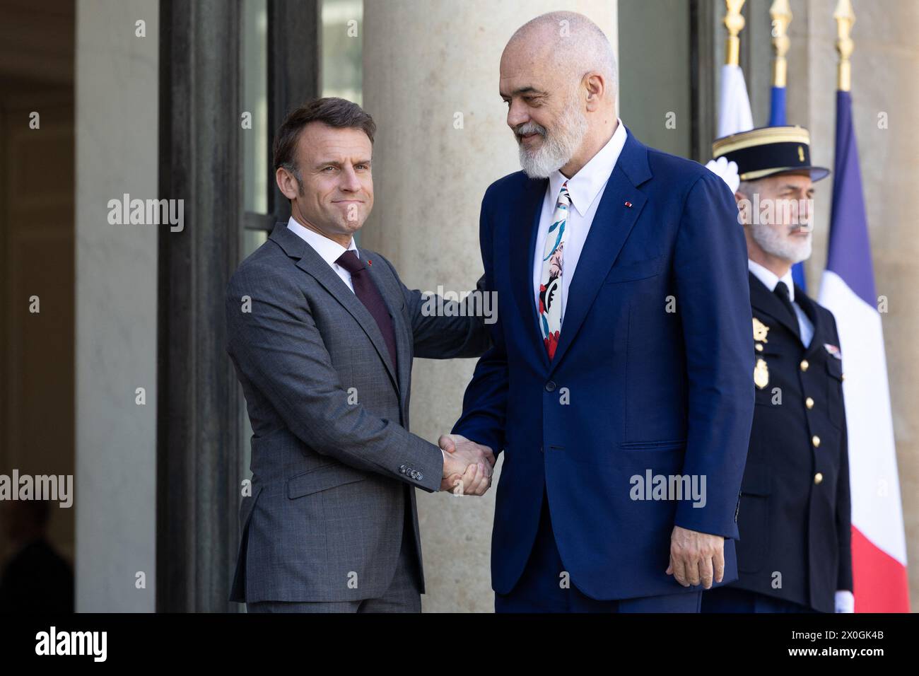 Paris, France. 12th Apr, 2024. French President Emmanuel Macron greets ...
