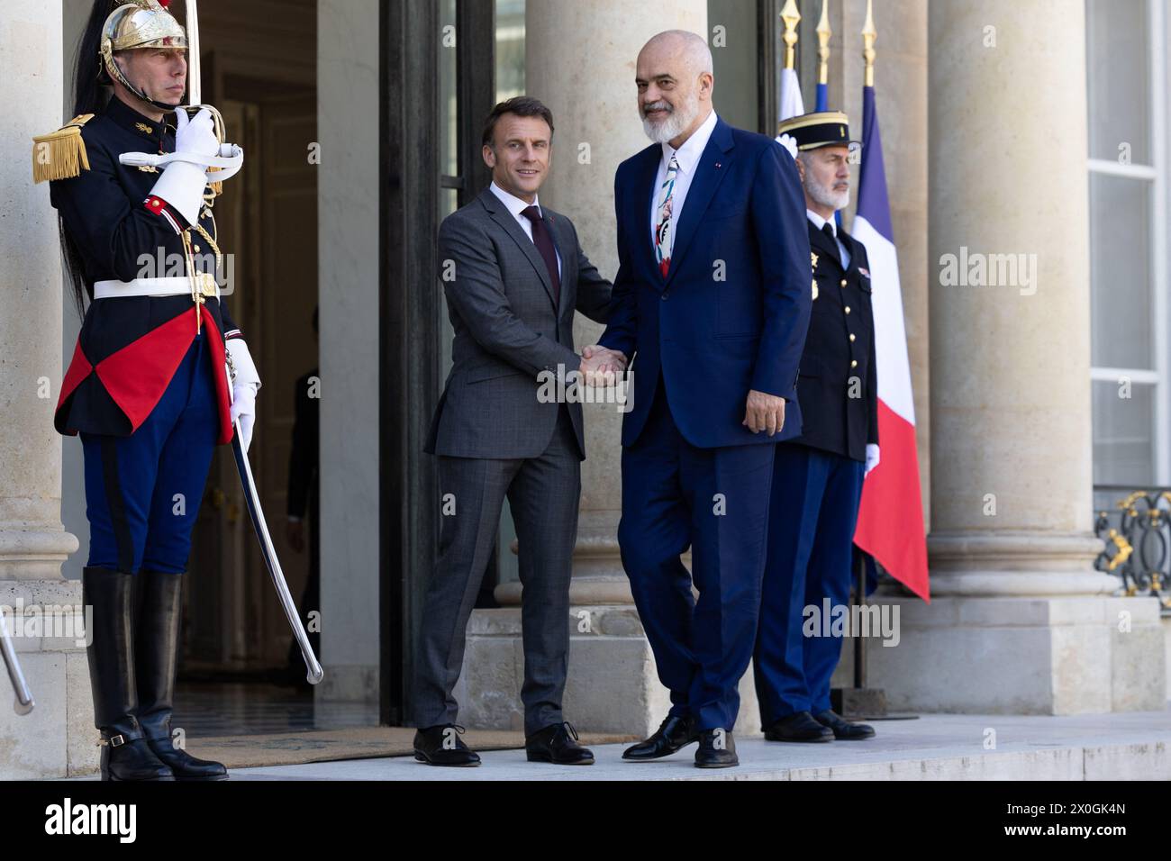 Paris, France. 12th Apr, 2024. French President Emmanuel Macron greets ...